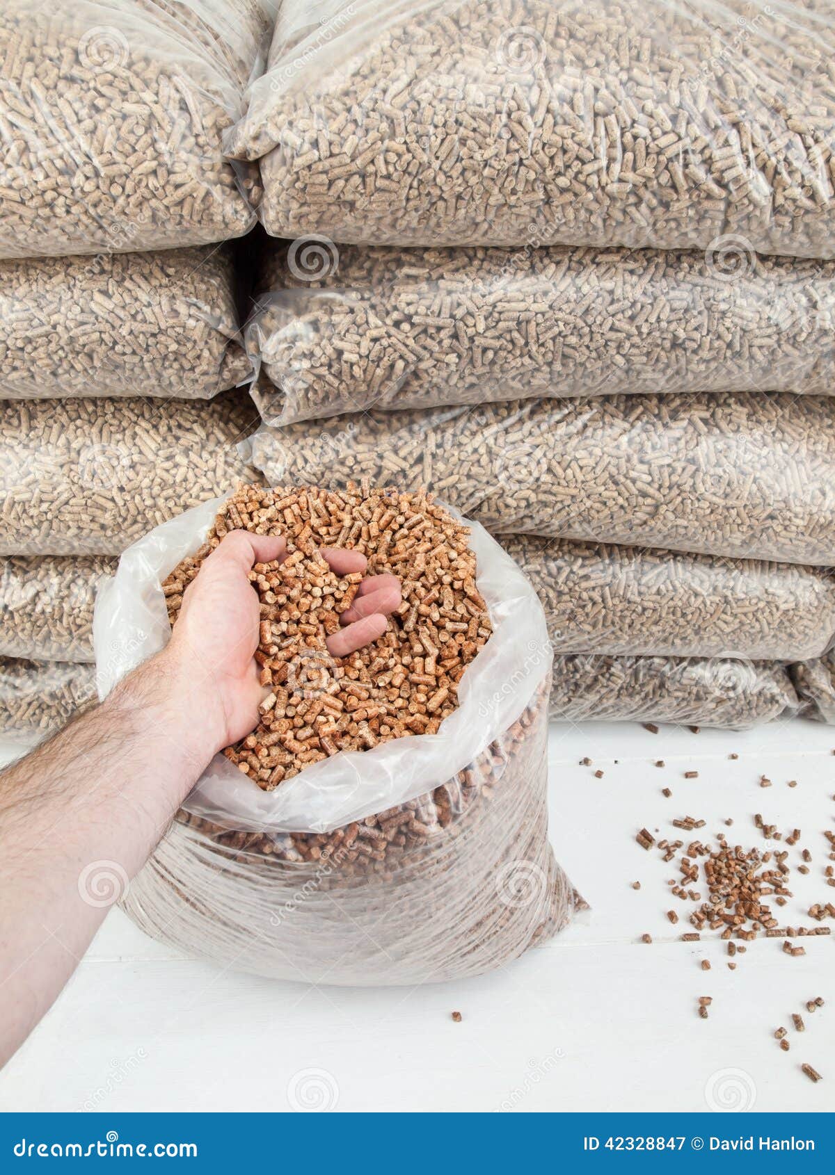 Wood pellets in mans hand stock image. Image of sacks - 42328847