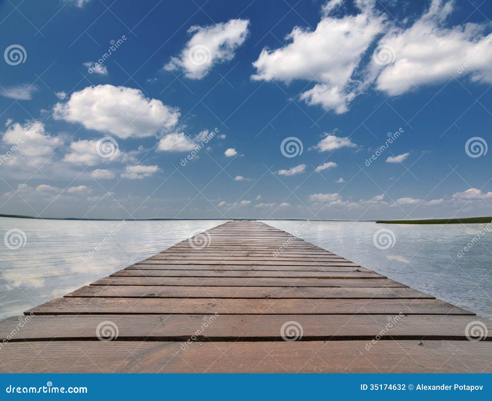 Wood Pier in Large Lake Under Blue Sky Stock Photo - Image of pier ...
