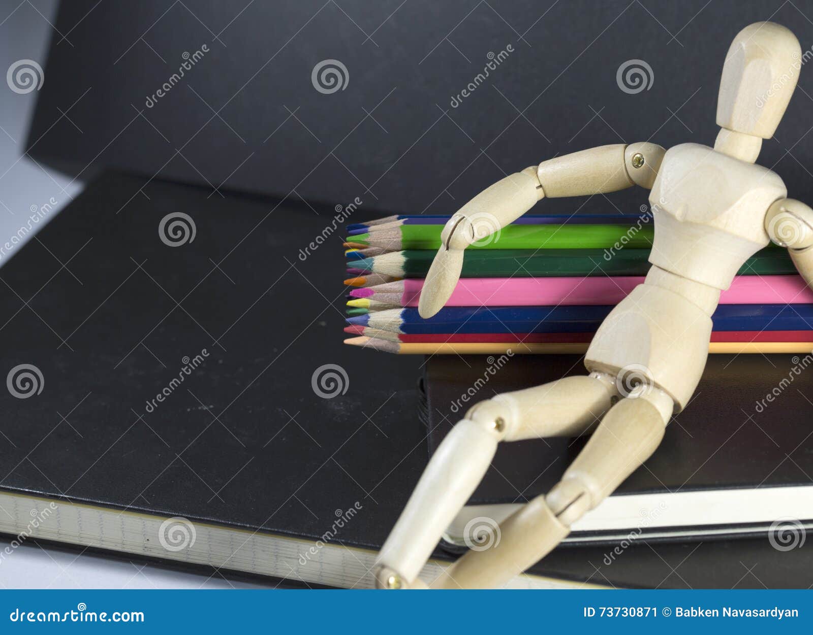 Wood Puppet Sitting on Sketchbook Stock Image - Image of designer ...