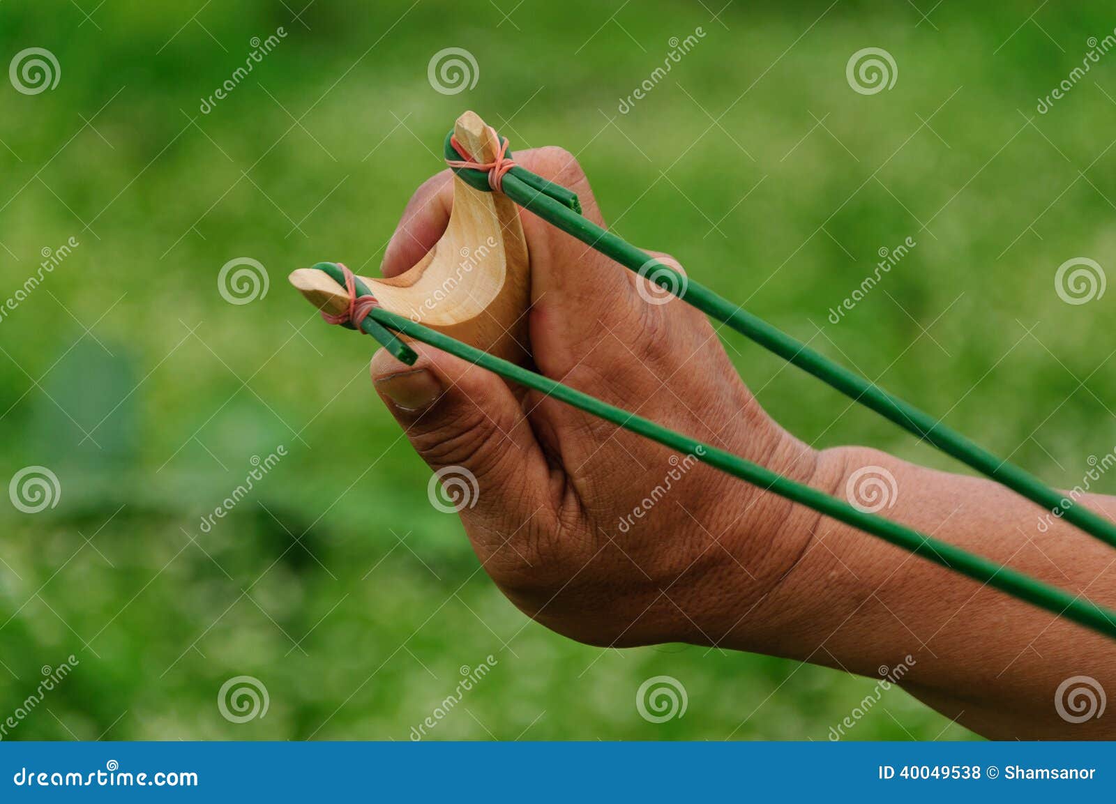 Wood Slingshot Catapult and Hands Stock Photo - Image of primary ...