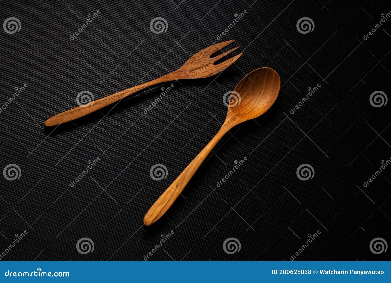 Wood Spoon and Fork Put on Black Canvas Stock Photo - Image of brown ...