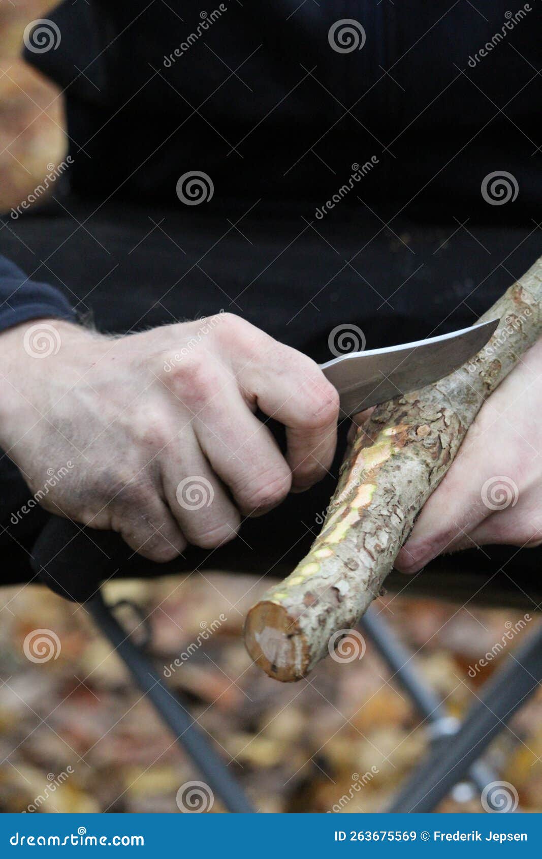 Wood stick and knife stock image. Image of finger, hand - 263675569