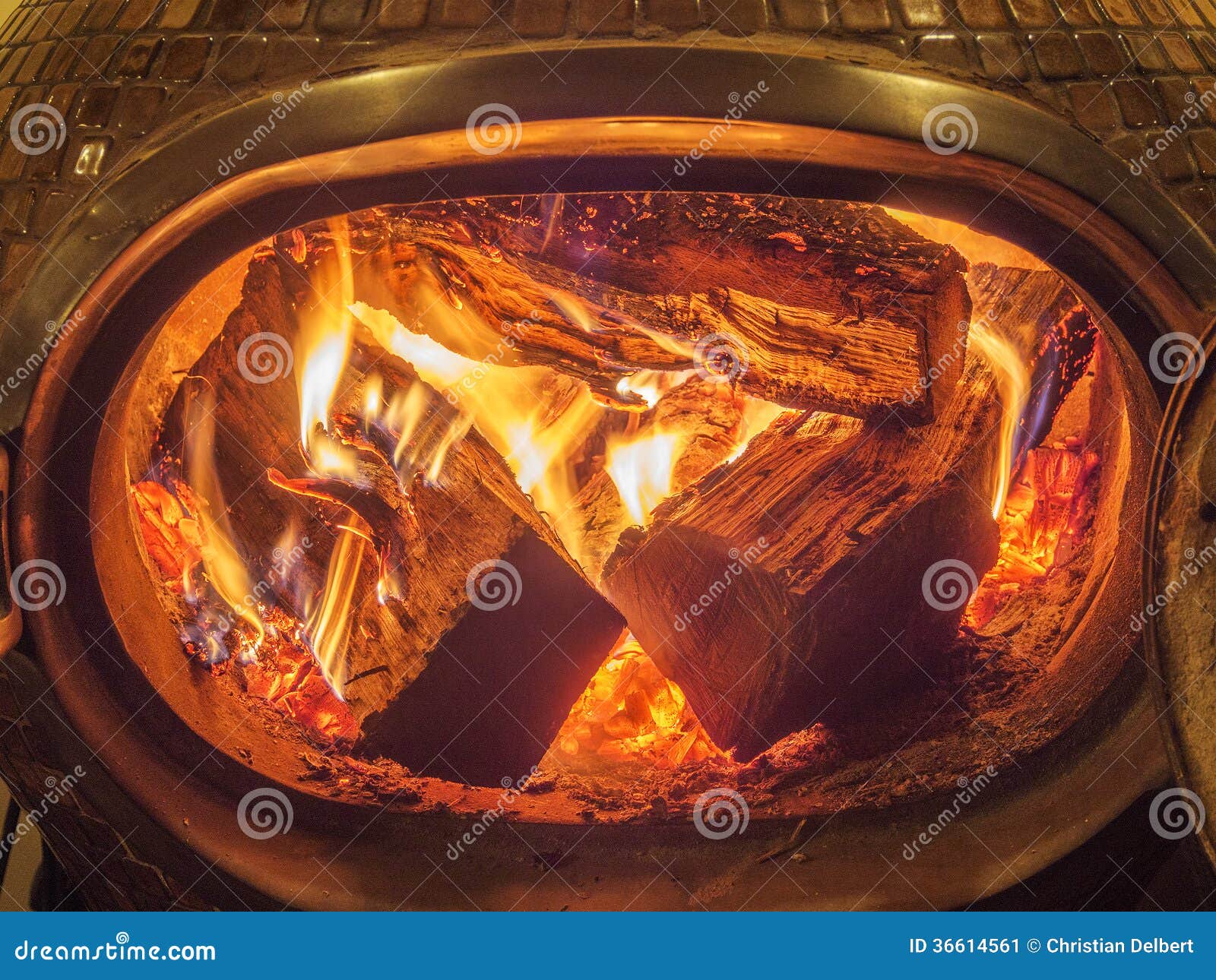 Wood Stove with Logs Burning Inside Stock Image - Image of hearth ...