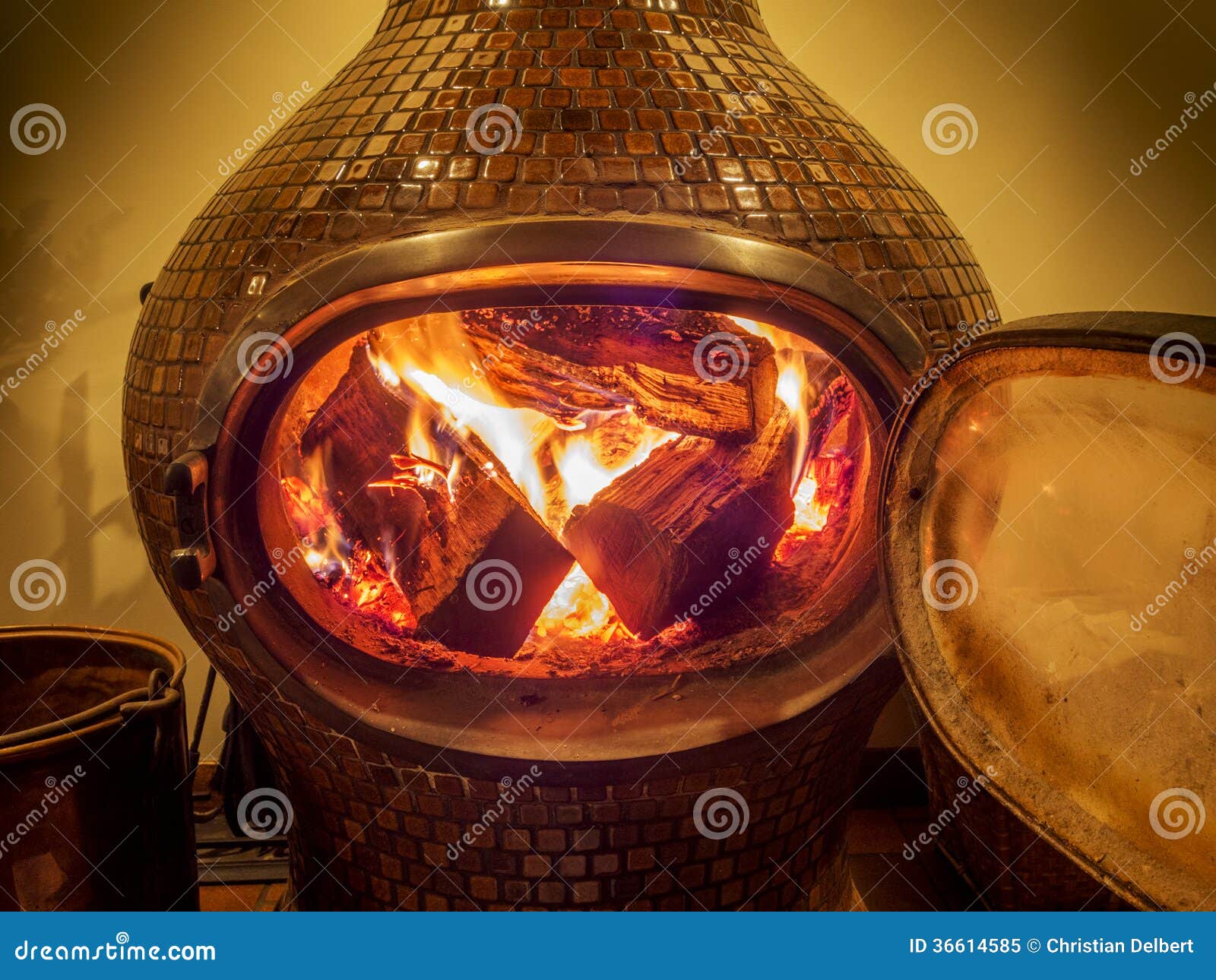 Wood Stove with Logs Burning Inside Stock Image - Image of room, black ...