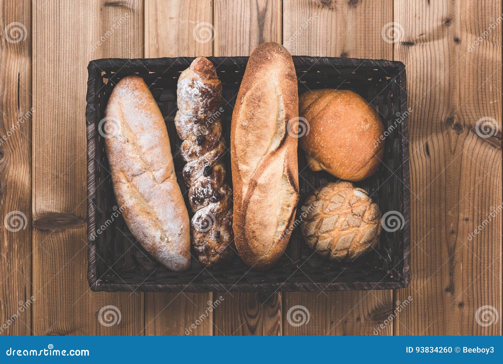 Wood table and breads stock photo. Image of breads, survice - 93834260