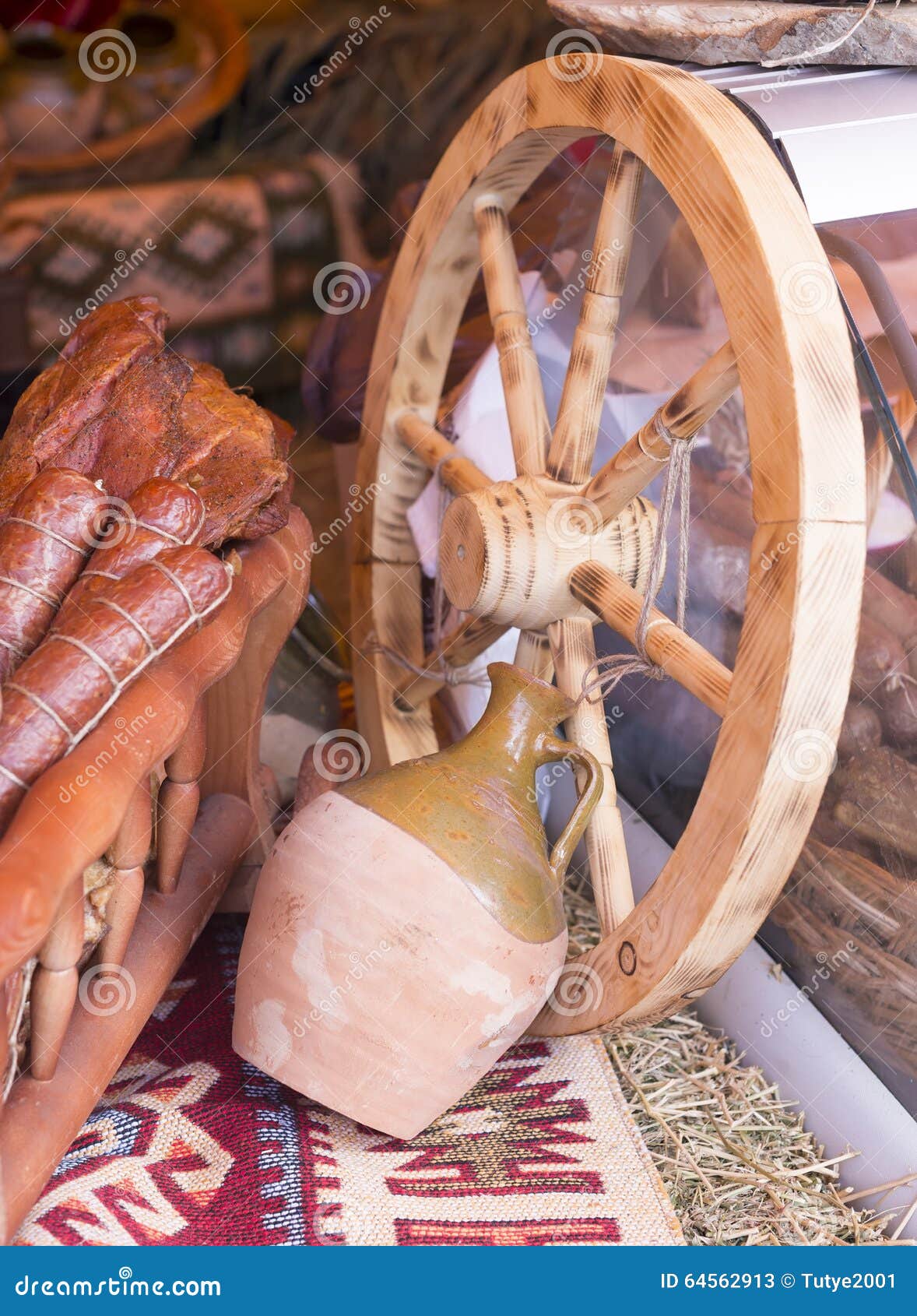 Wood Wheel and and Different Sorts of Meat at Market Stock Image ...