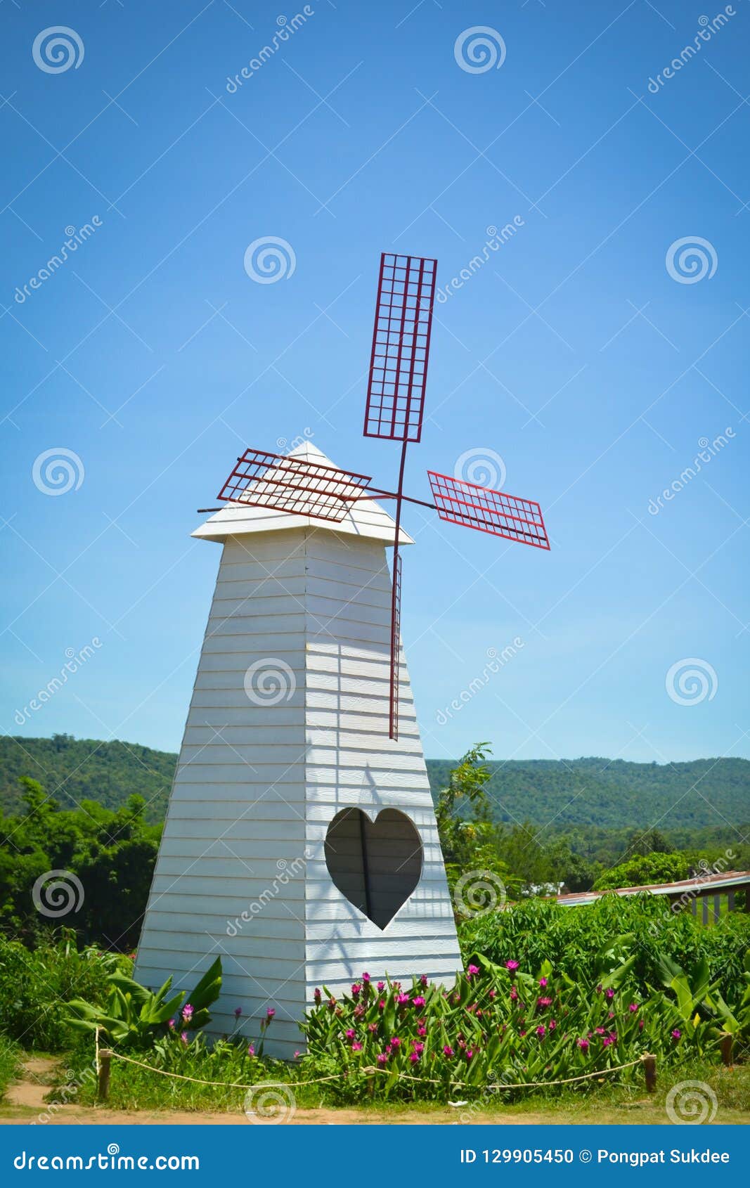 Wood wind turbine stock photo. Image of heart, beauty - 129905450