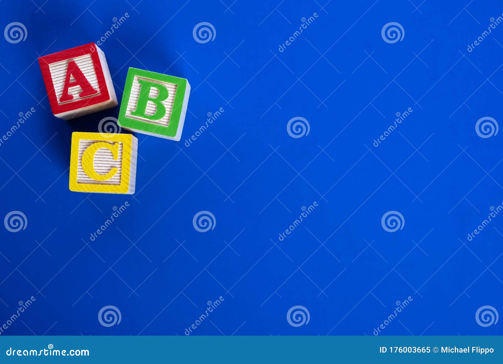 Wooden ABC Blocks on Blue Background Stock Image - Image of elementary ...