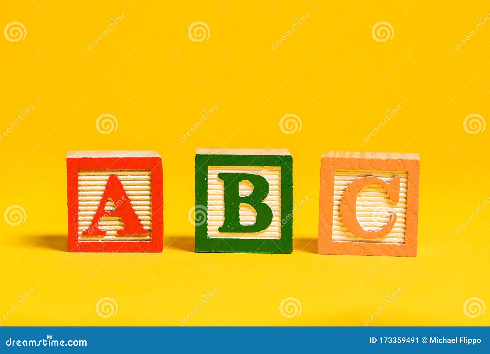 Wooden ABC Blocks on Yellow Background Stock Image - Image of letter ...