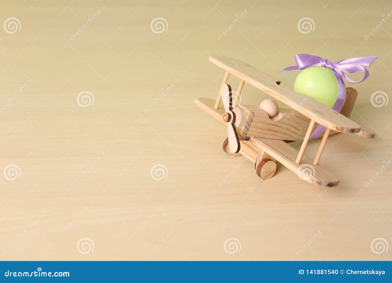 Wooden Airplane with Cute Easter Egg on Table Stock Photo - Image of ...