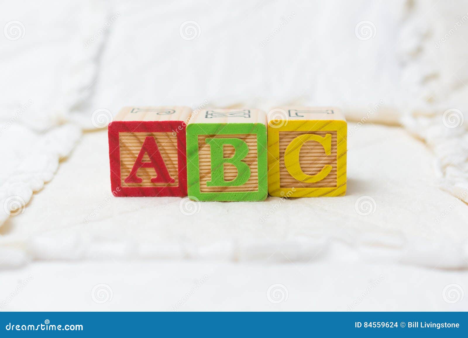 Wooden Alphabet Blocks on Quilt Spelling ABC Horizontal Stock Photo ...
