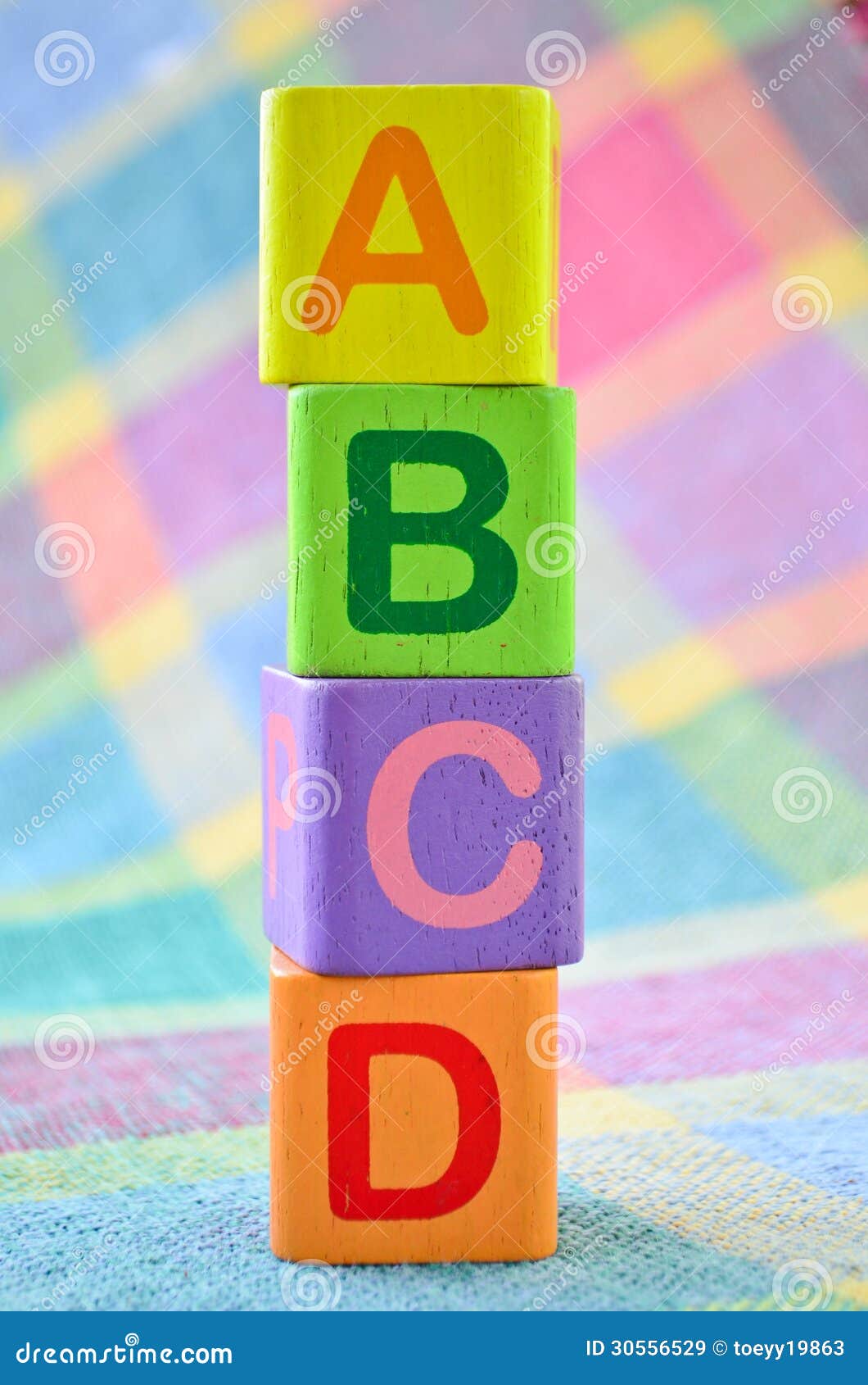 Wooden alphabet blocks toy stock image. Image of letter - 30556529