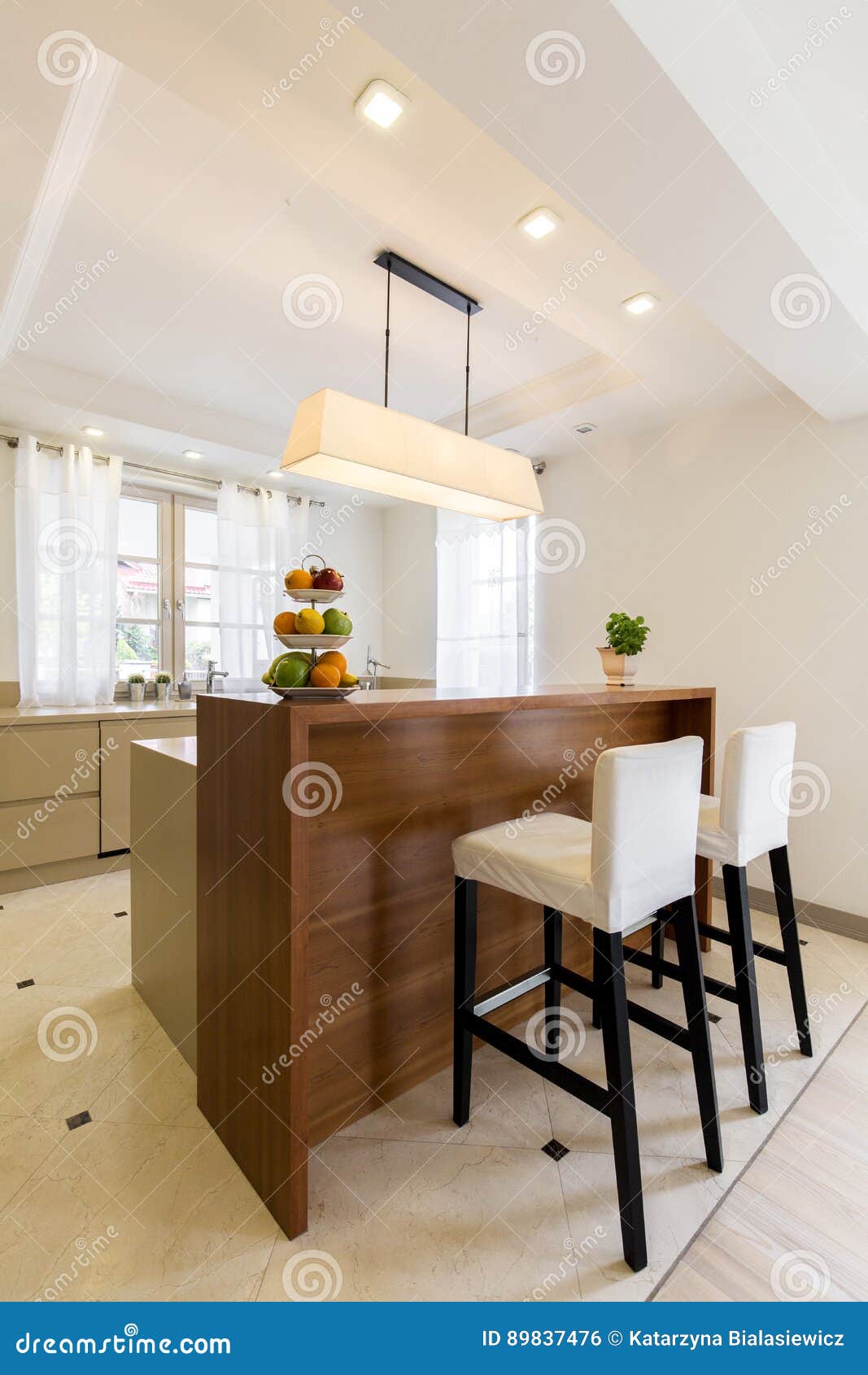 Wooden Bar Table in an Elegant Kitchen Stock Photo - Image of interior ...