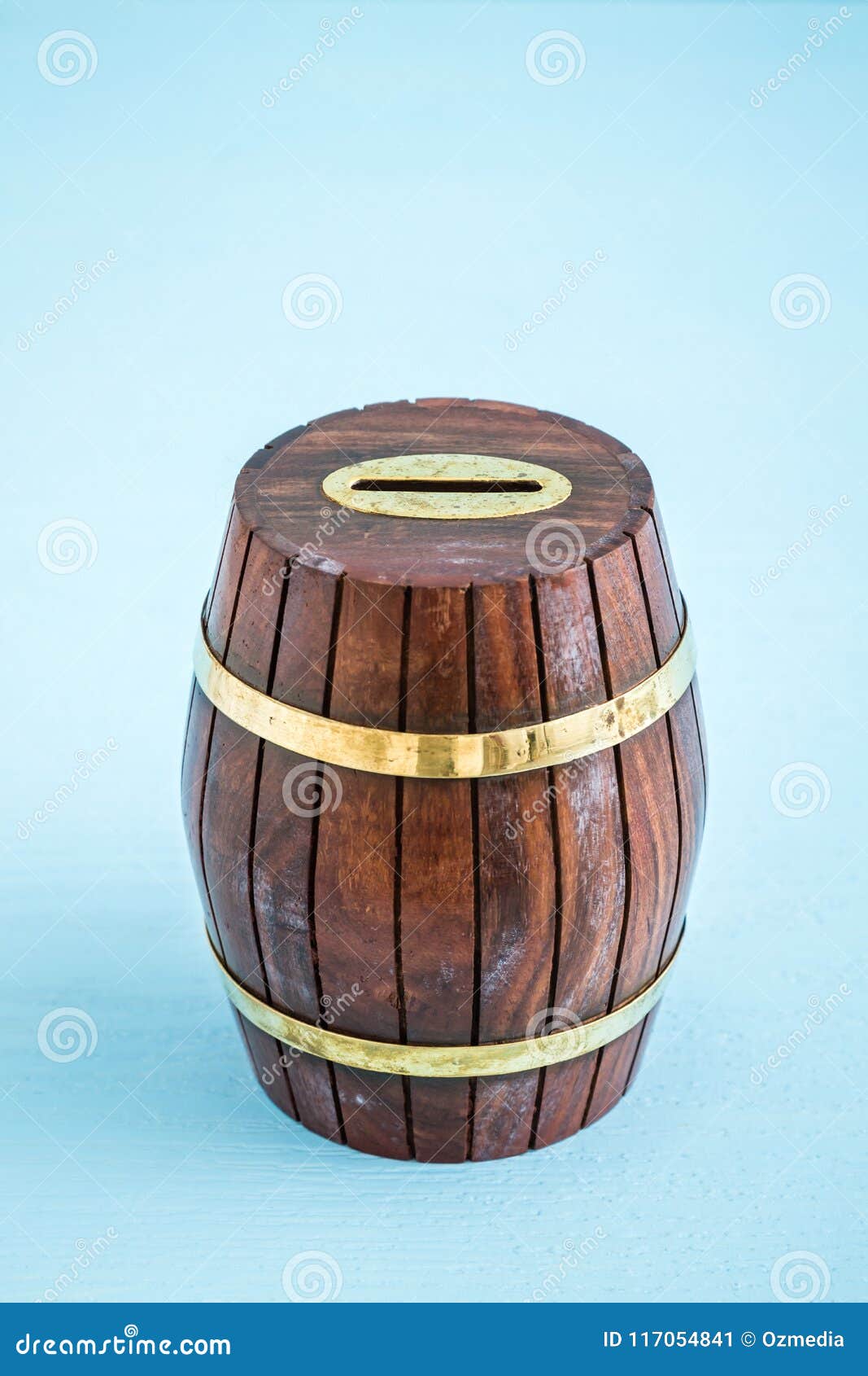 Wooden Barrel Money Box on Blue Background Stock Image - Image of metal ...