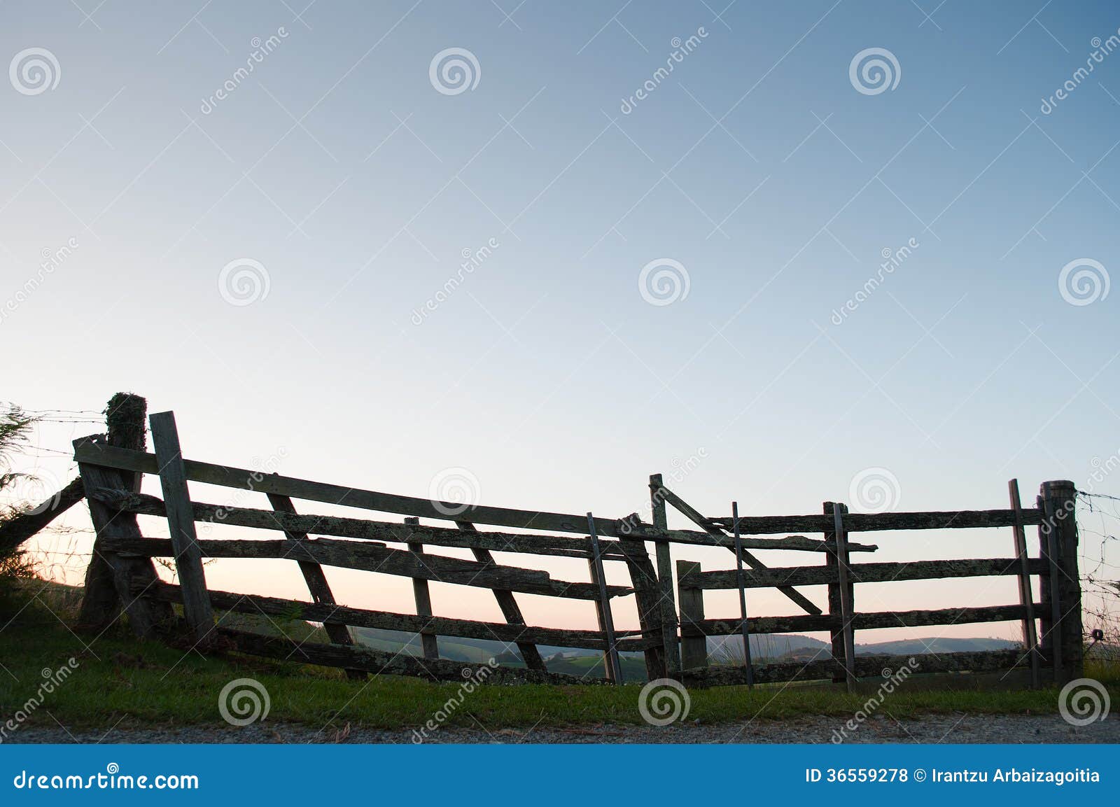 Wooden Barrier in a Rural Field Stock Photo - Image of farm, meadow ...