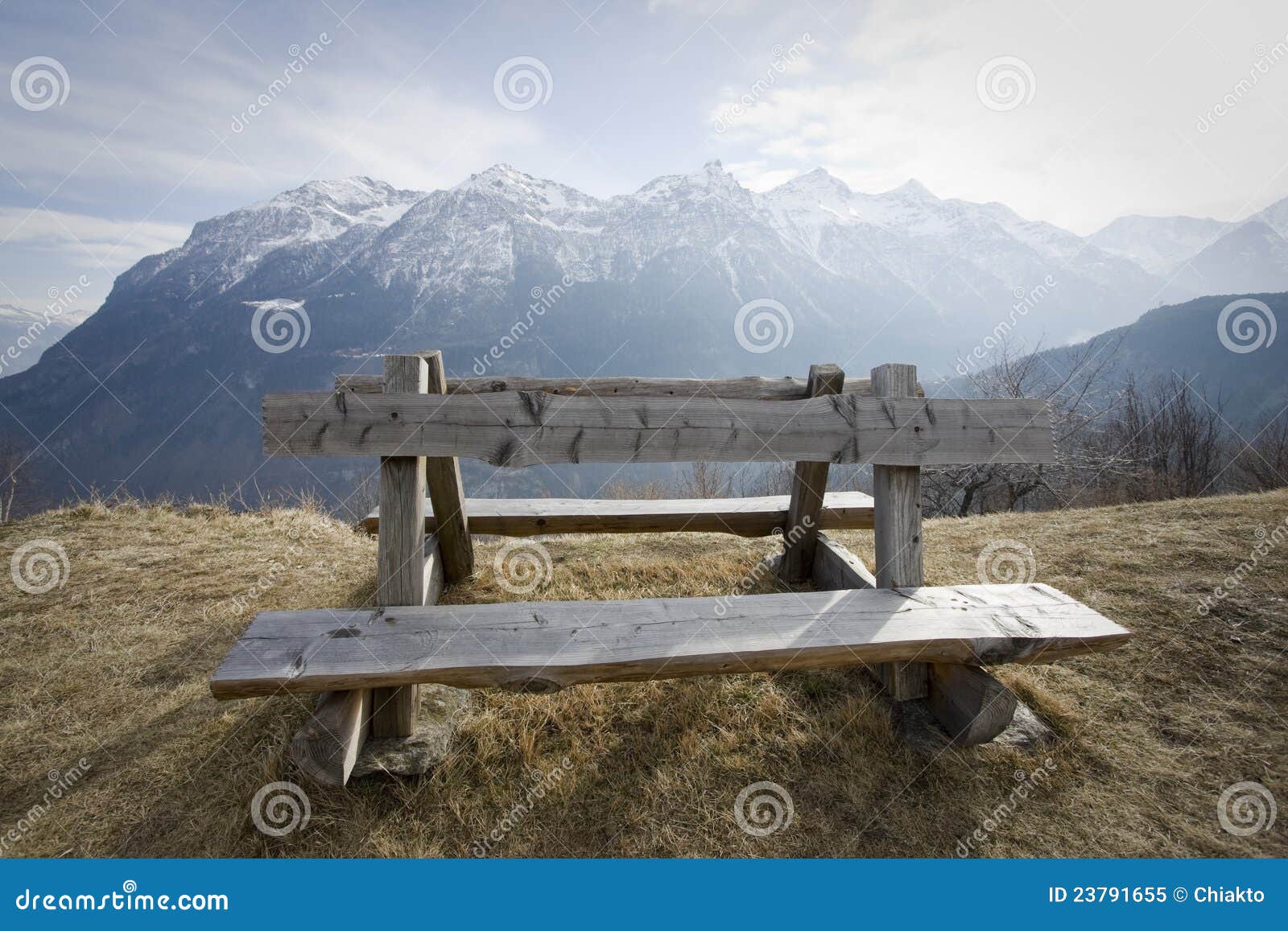Wooden bench on the alps stock image. Image of bench - 23791655