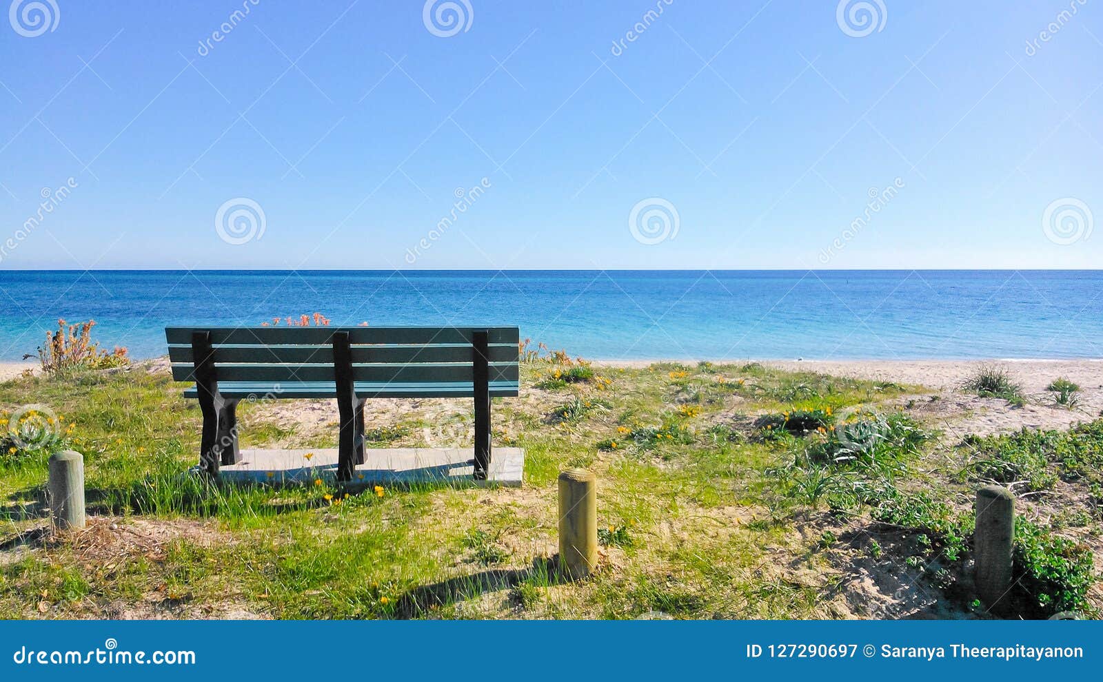 Wooden bench by the beach stock image. Image of tranquil - 127290697