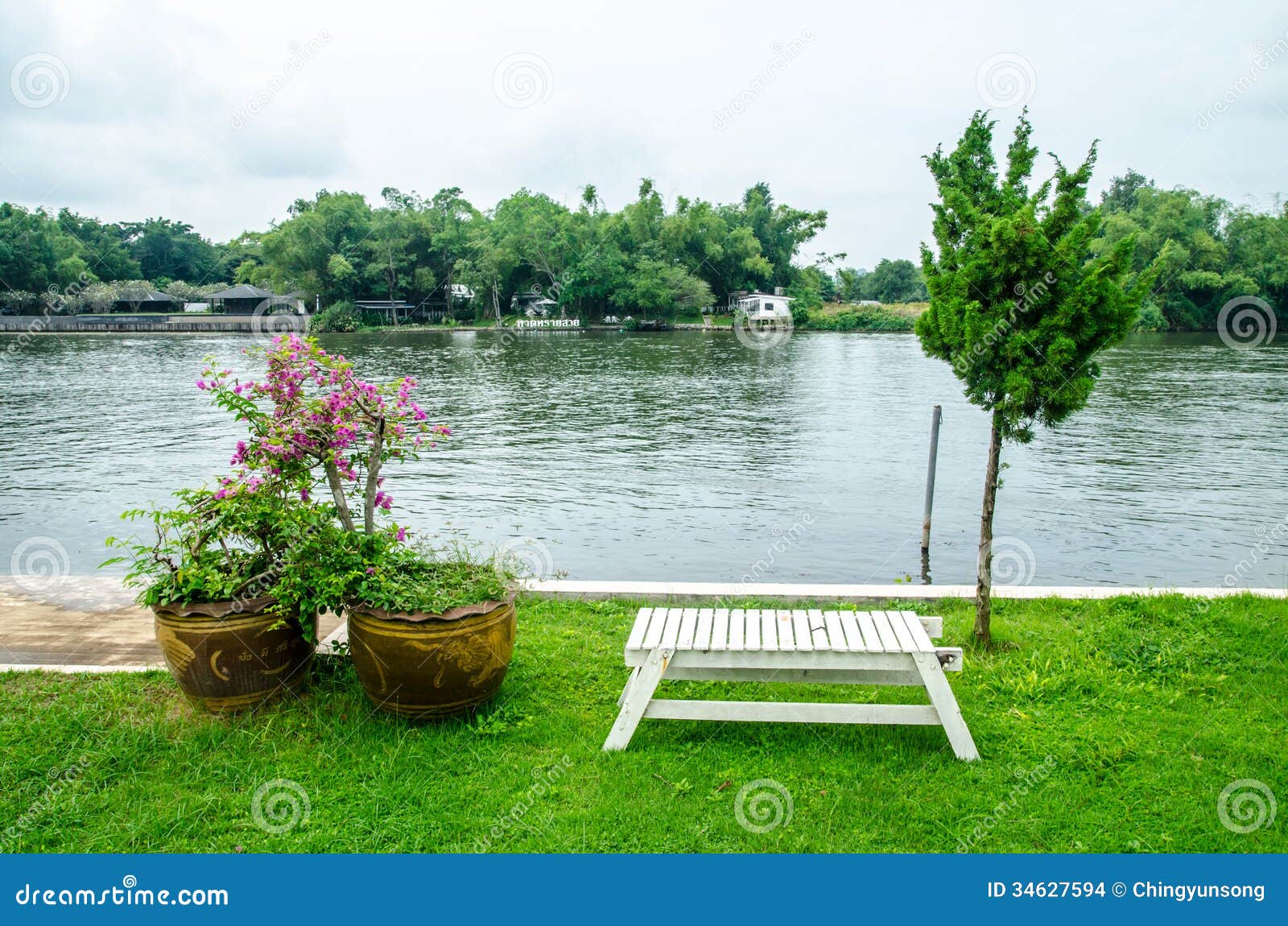 Wooden bench at the lake stock photo. Image of beauty - 34627594