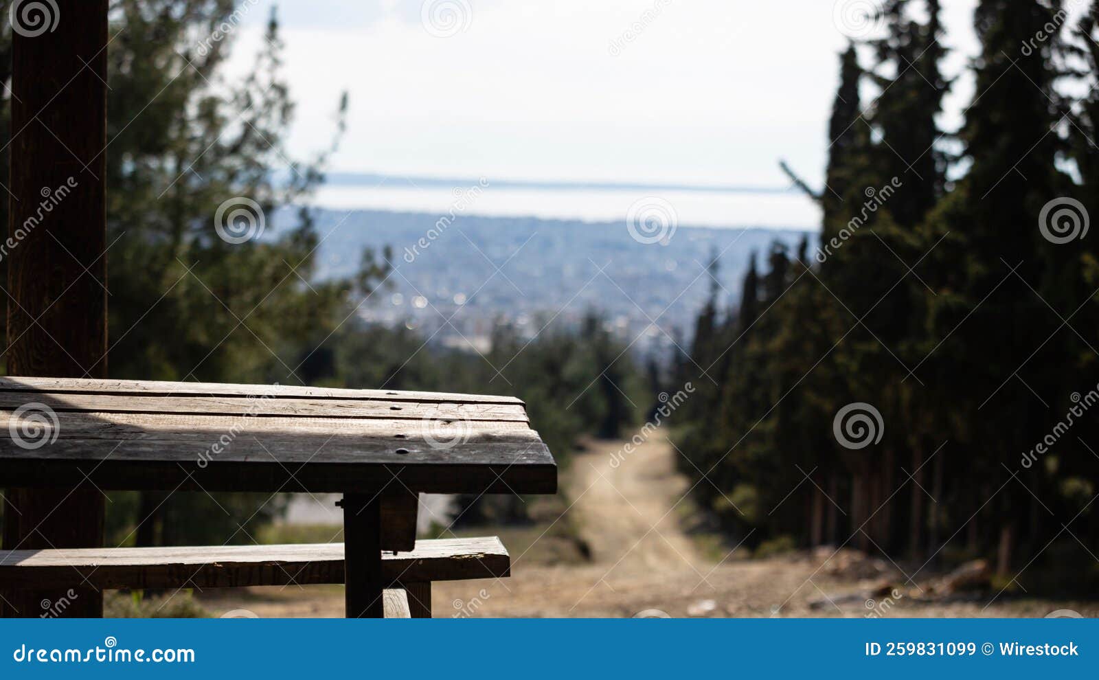 Wooden Bench and a Narrow Path Going Down To the Beach an City Stock ...