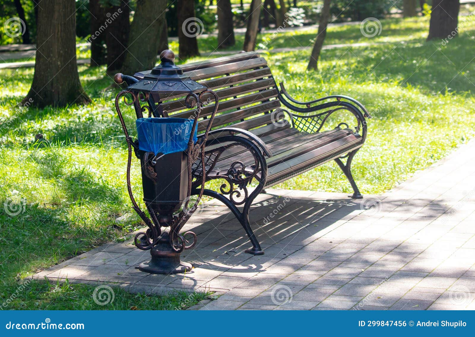 Wooden Bench with Trash Can in the Park Stock Photo - Image of ...