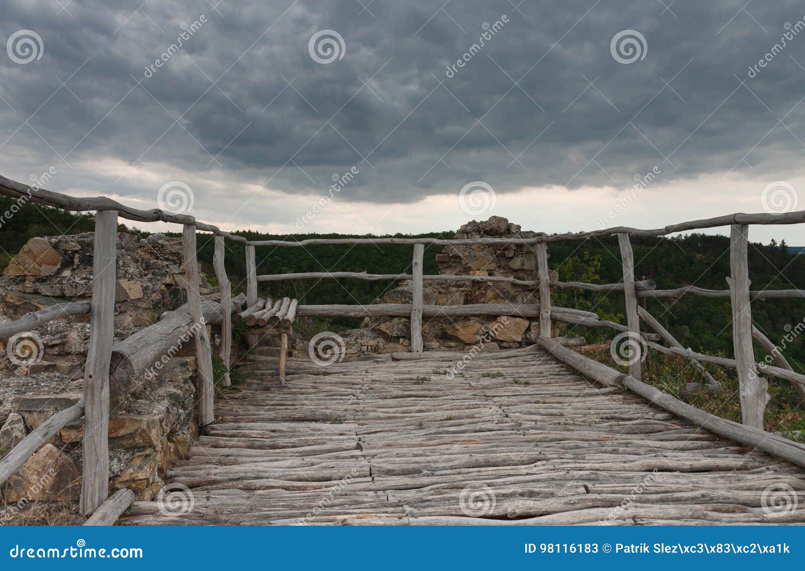 Wooden Benche on Castle Ruins, in Backgrounds is Cloudy Sky. Stock ...