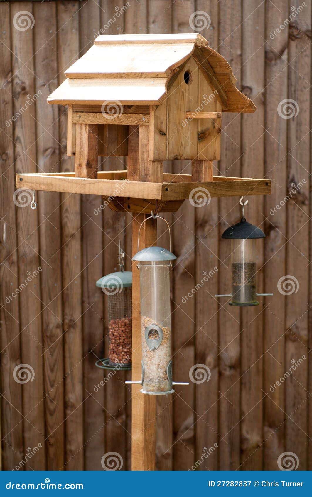 Wooden Bird Feeding Table stock image. Image of park - 27282837