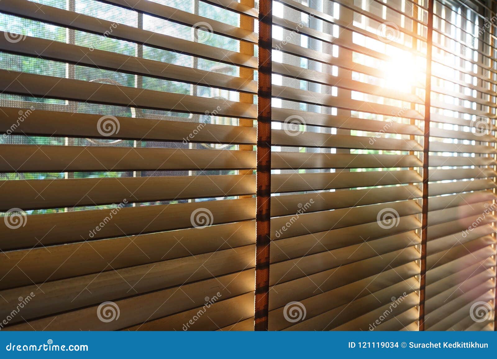 Wooden Blinds in a Home Catching the Sunlight with Burst Light Stock ...