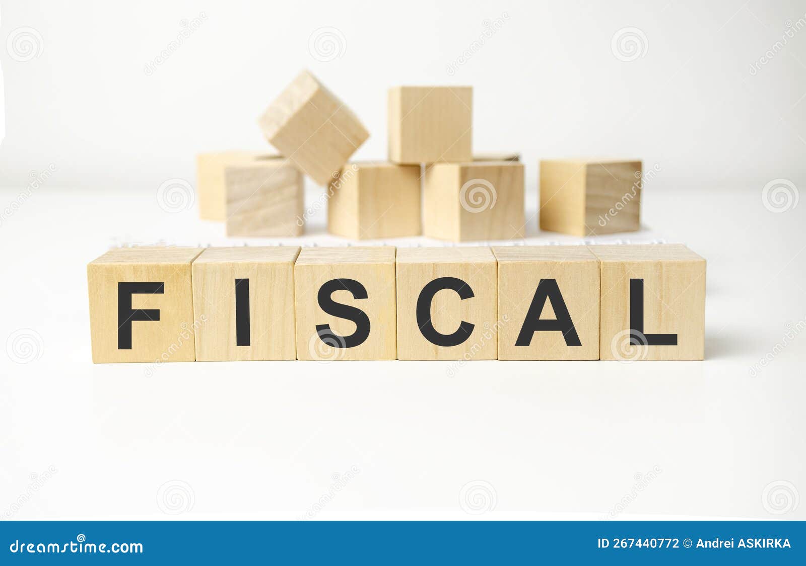 Wooden block fiscal word stock photo. Image of manager - 267440772