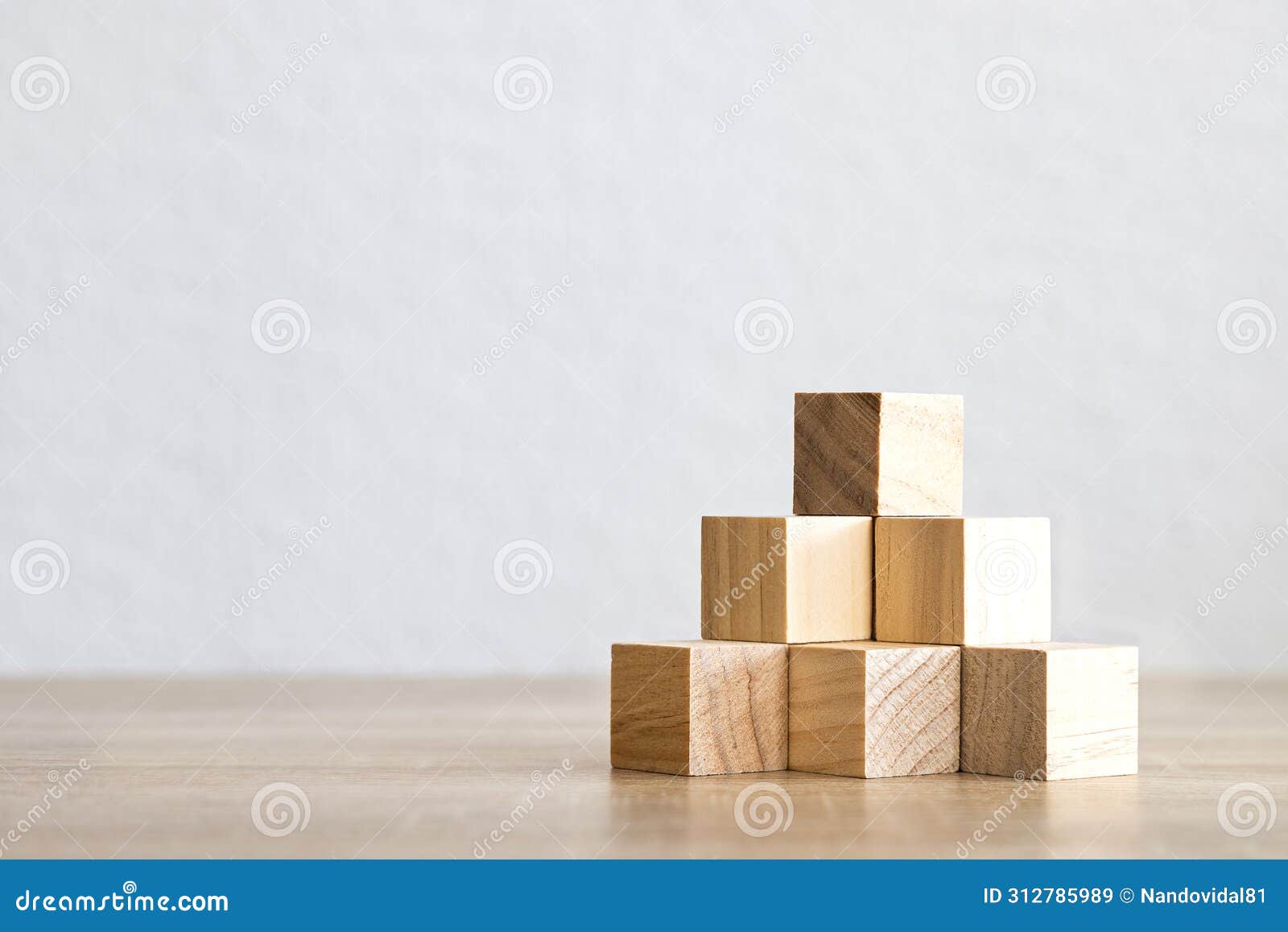 Wooden Block Pyramid on Table Stock Image - Image of abstract, copy ...