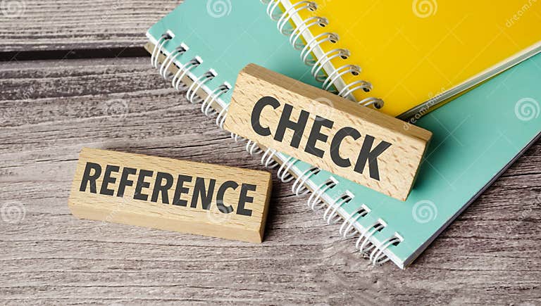 Wooden Block with Text REFERENCE CHECKS and Notebooks Stock Image ...
