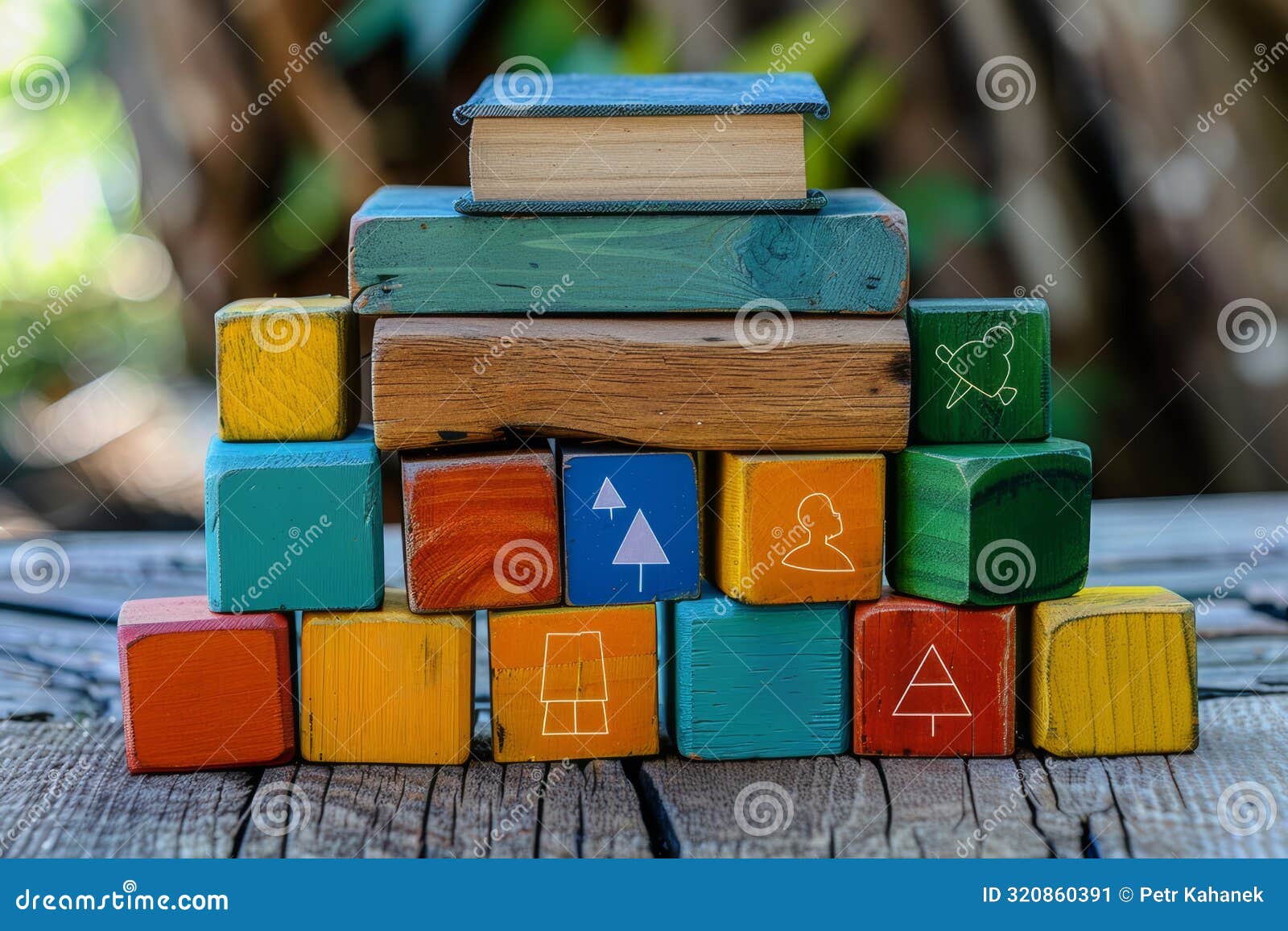 Wooden Blocks Arranged in a Foundational Structure with a Stack of ...