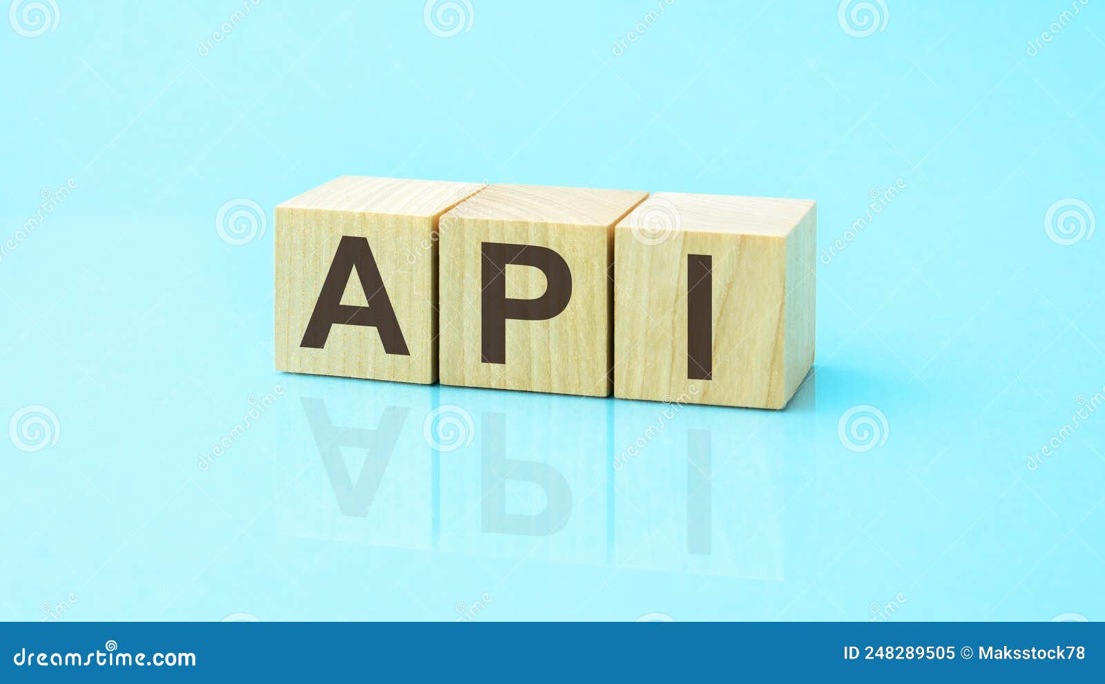 Wooden Blocks with the Letters API, Blue Background Stock Image - Image ...