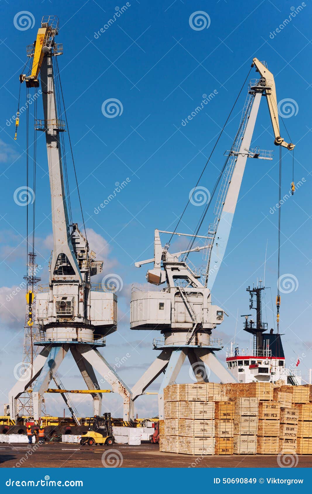 Wooden Blocks on the Loading at the Port with Cranes Stock Image ...