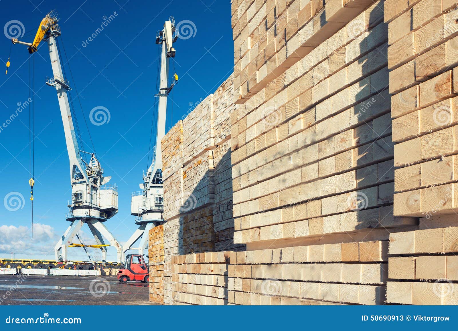 Wooden Blocks on the Loading at the Port with Cranes Stock Image ...