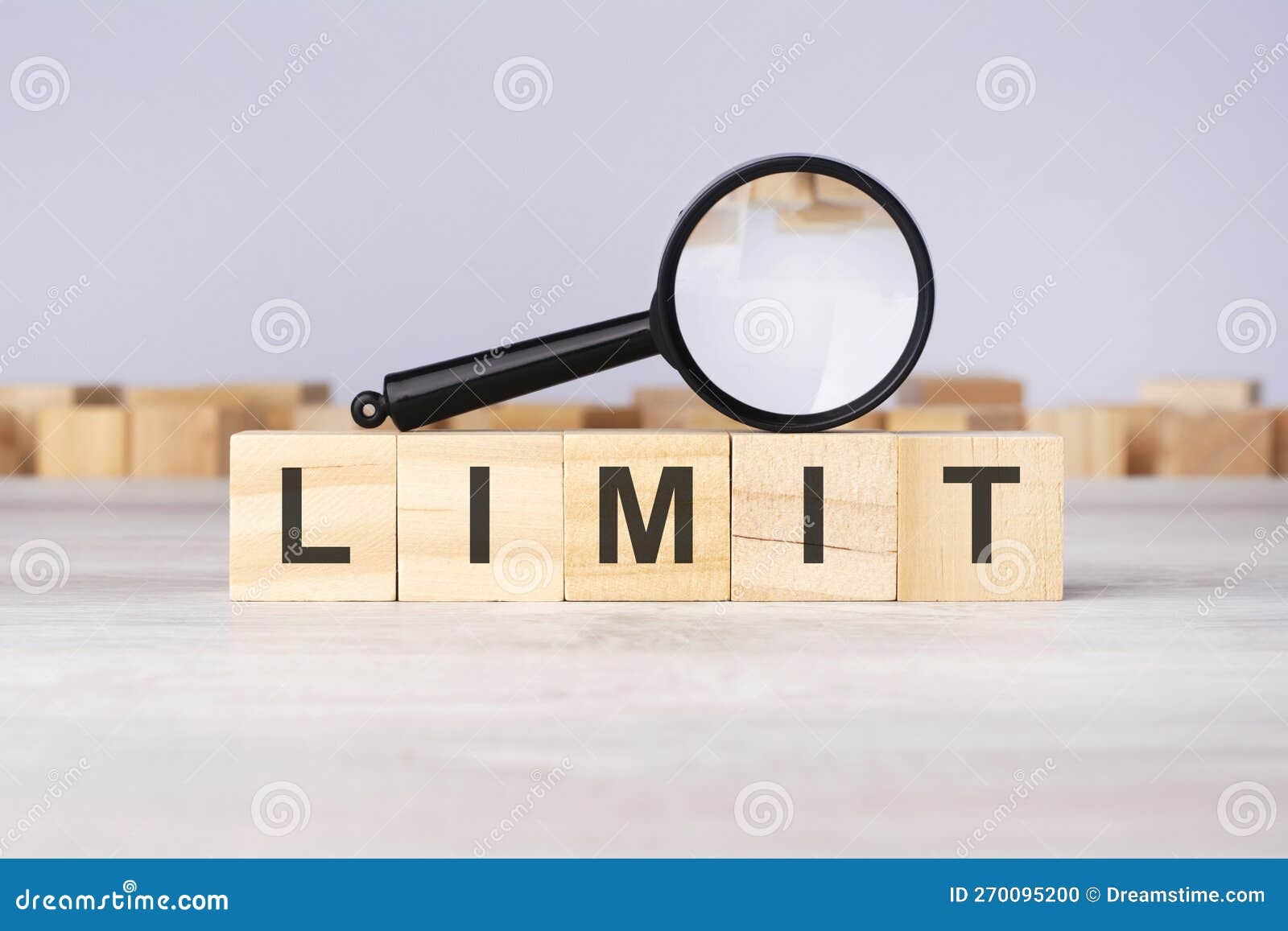Wooden Blocks with a Magnifying Glass Text: LIMIT Stock Photo - Image ...