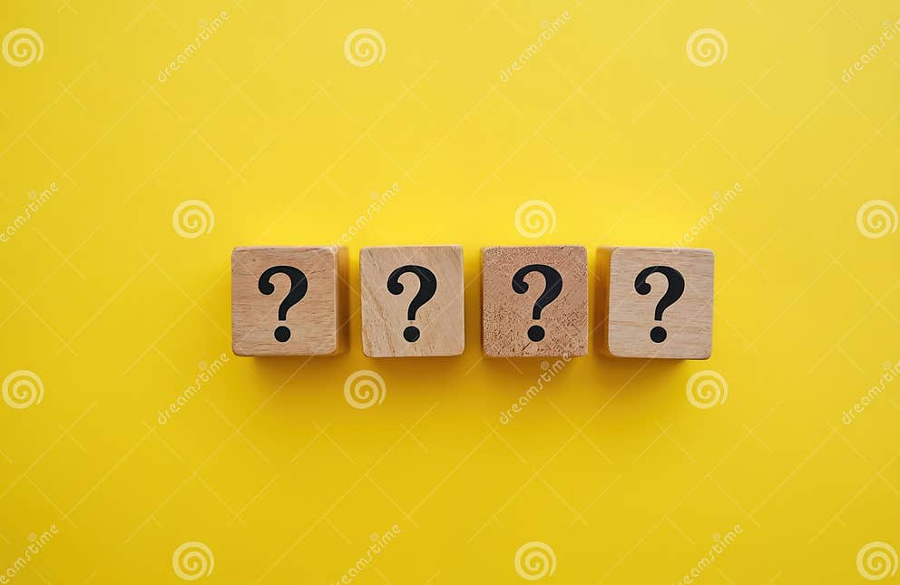 Wooden Blocks with Question Marks on Bright Yellow Background. Simple ...