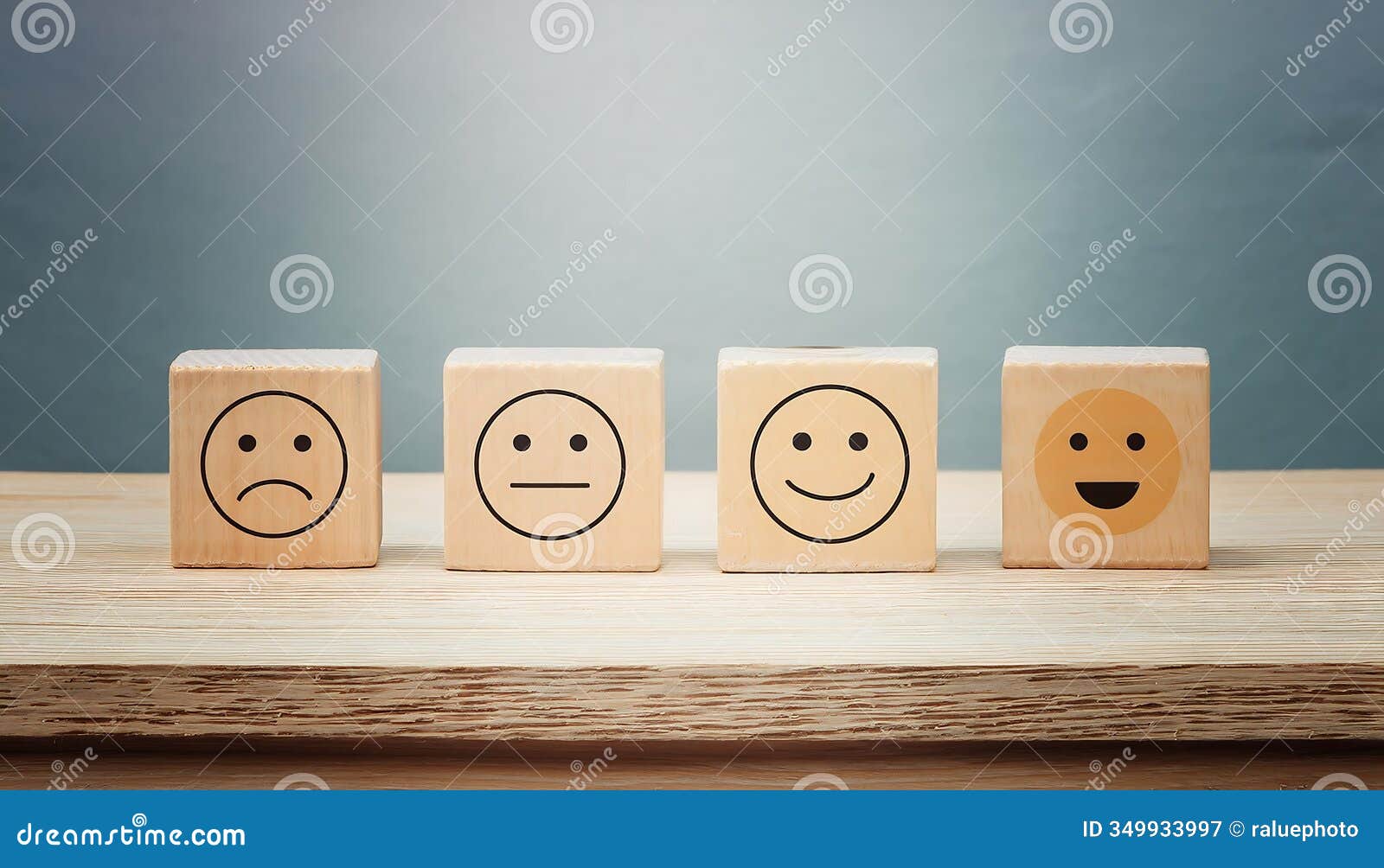 Wooden Blocks with Smiley Faces are Stacked on a Wooden Surface ...
