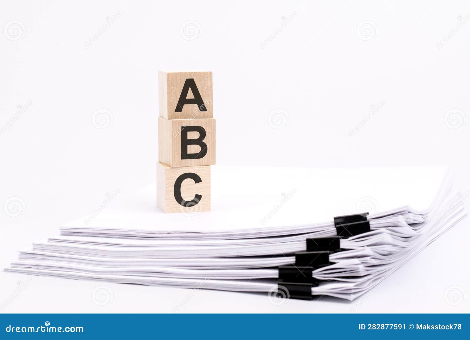 Wooden Blocks with Text ABC on White Table, Stack White Paper on ...