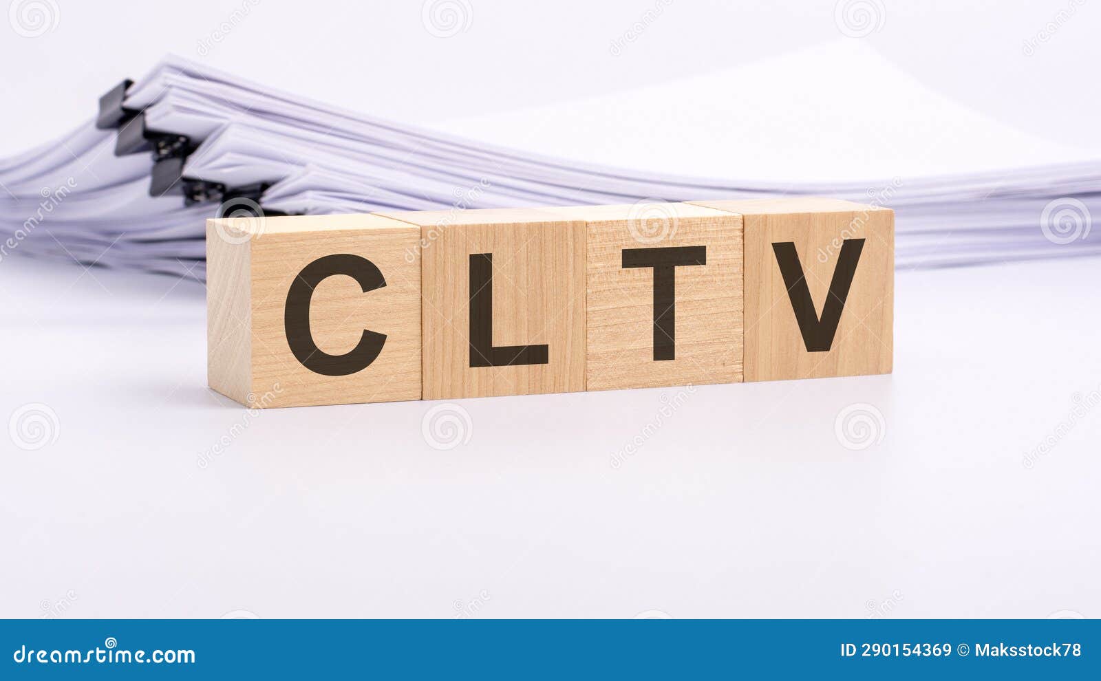 Wooden Blocks with Text CLTV on White Table, Stack White Paper on ...