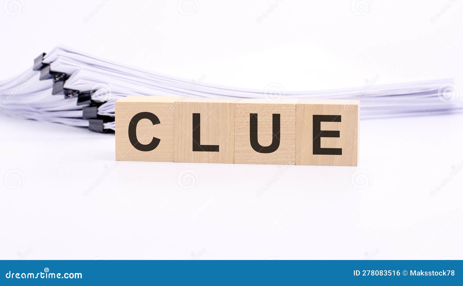 Wooden Blocks with Text CLUE on White Table, Stack White Paper on ...