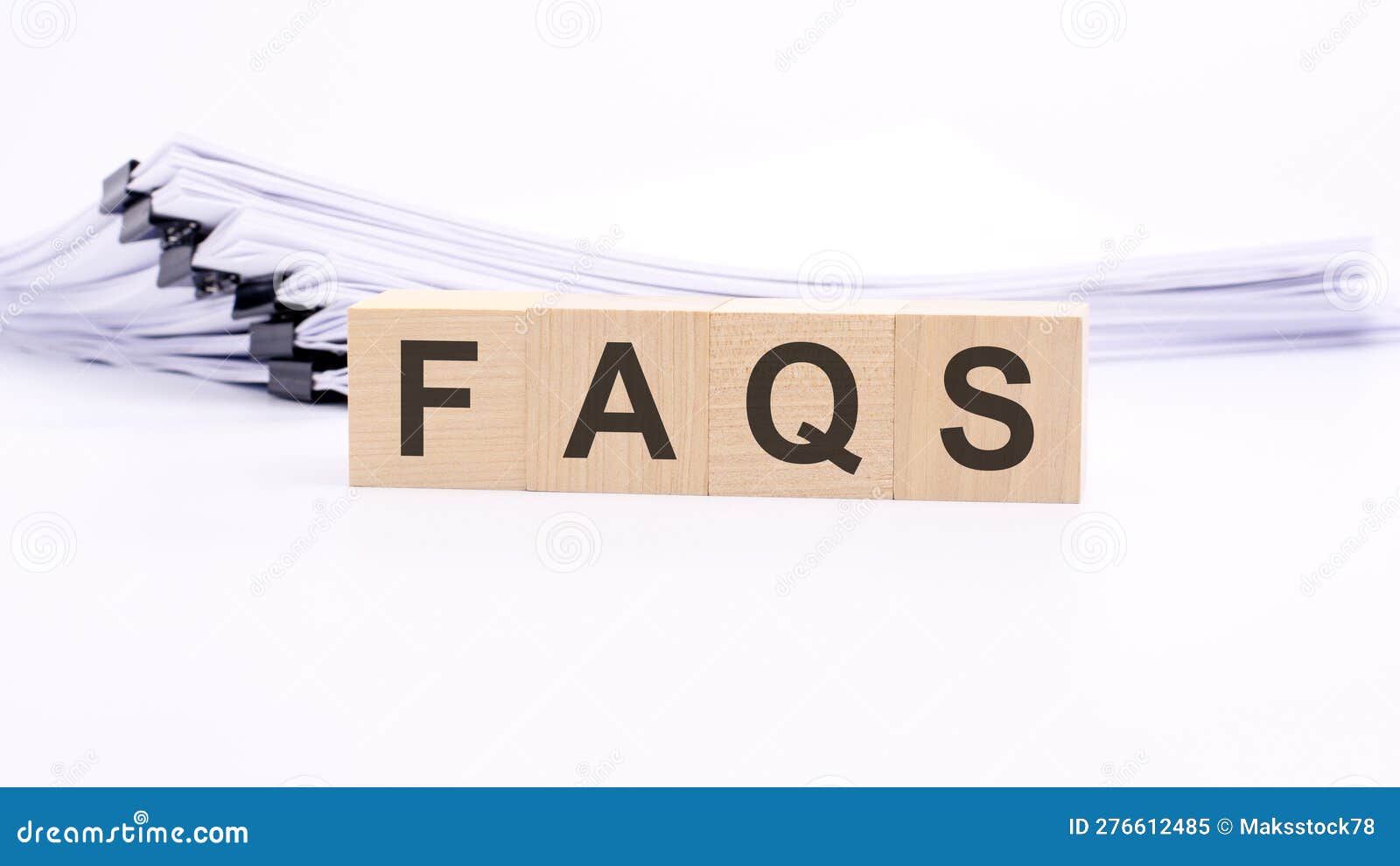 Wooden Blocks with Text FAQS on White Table, Stack White Paper on ...