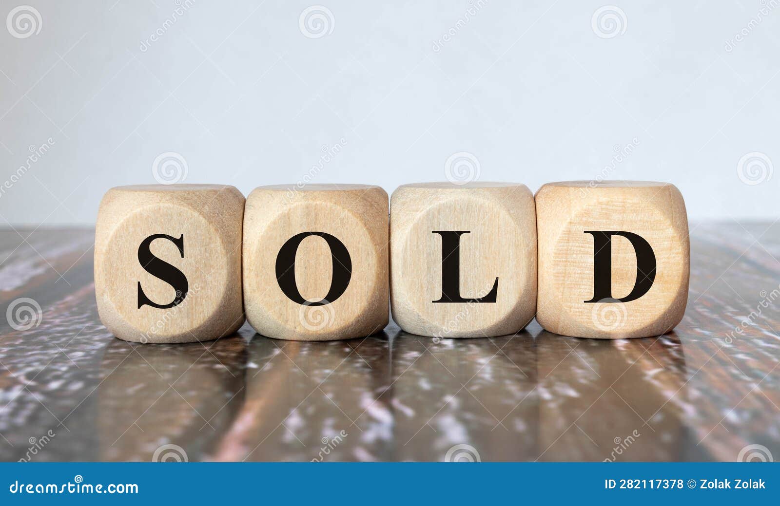 Wooden Blocks with the Text: Sold, Concept Stock Photo - Image of ...