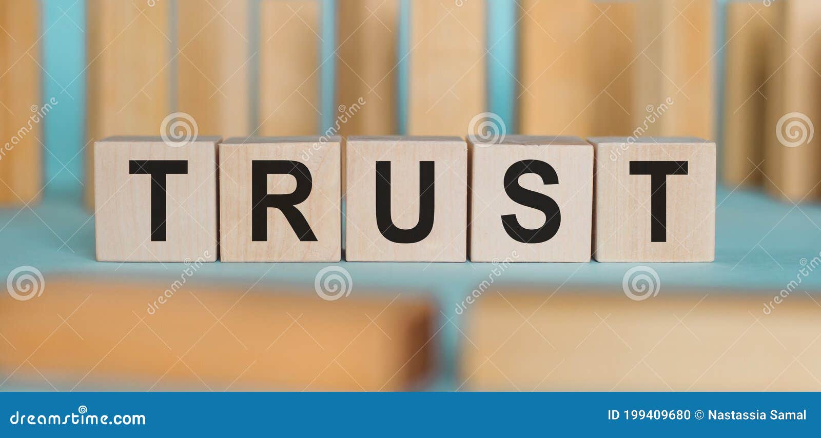 Wooden Blocks with the Text Trust on Blue Table Stock Photo - Image of ...