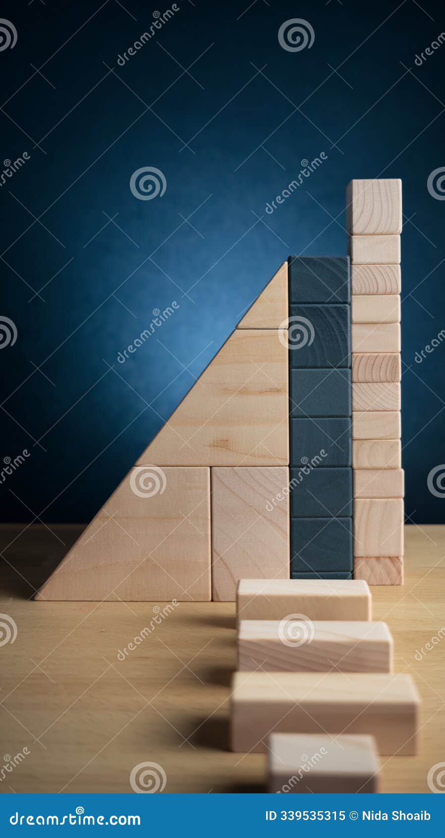 Wooden Blocks and Triangular Structure Symbolize Stability, Set Against ...