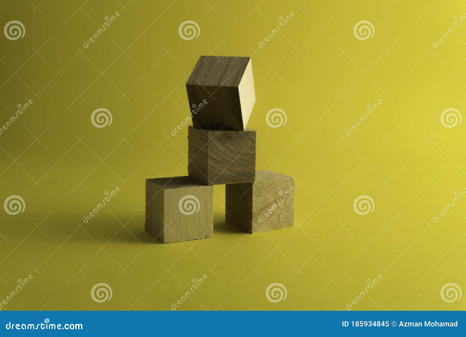 Wooden Blocks on a Yellow Background. Stock Image - Image of group ...