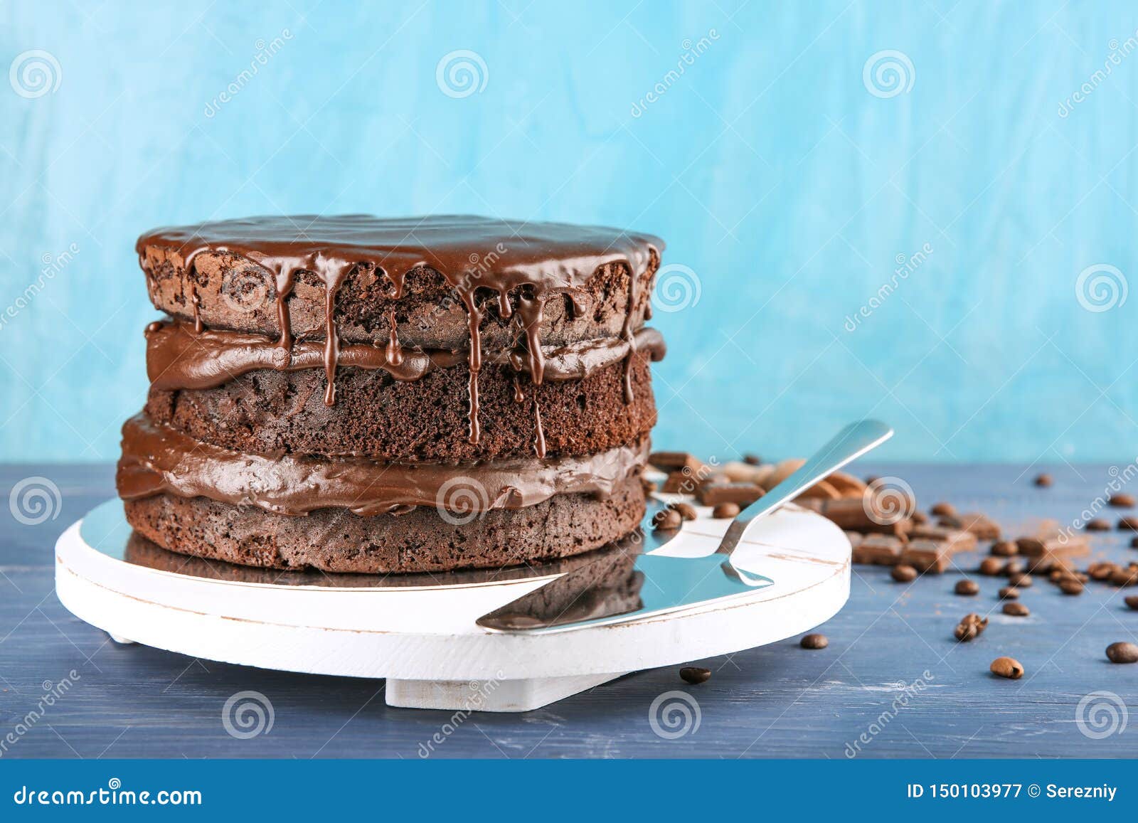 Wooden Board with Delicious Chocolate Cake on Table Stock Image - Image ...
