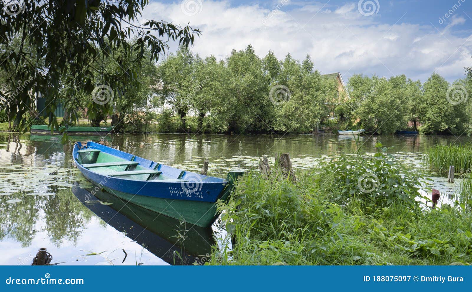Wooden Boat on the River among the Trees Editorial Photography - Image ...