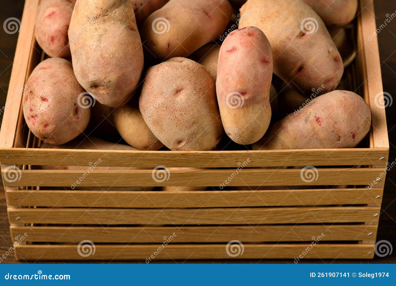 Wooden Box Full of Potatoes on Dark Wooden Background Stock Image ...