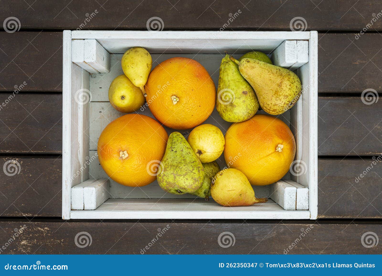 A Wooden Box Full of Ripe Citrus and Assorted Pears Stock Image - Image ...