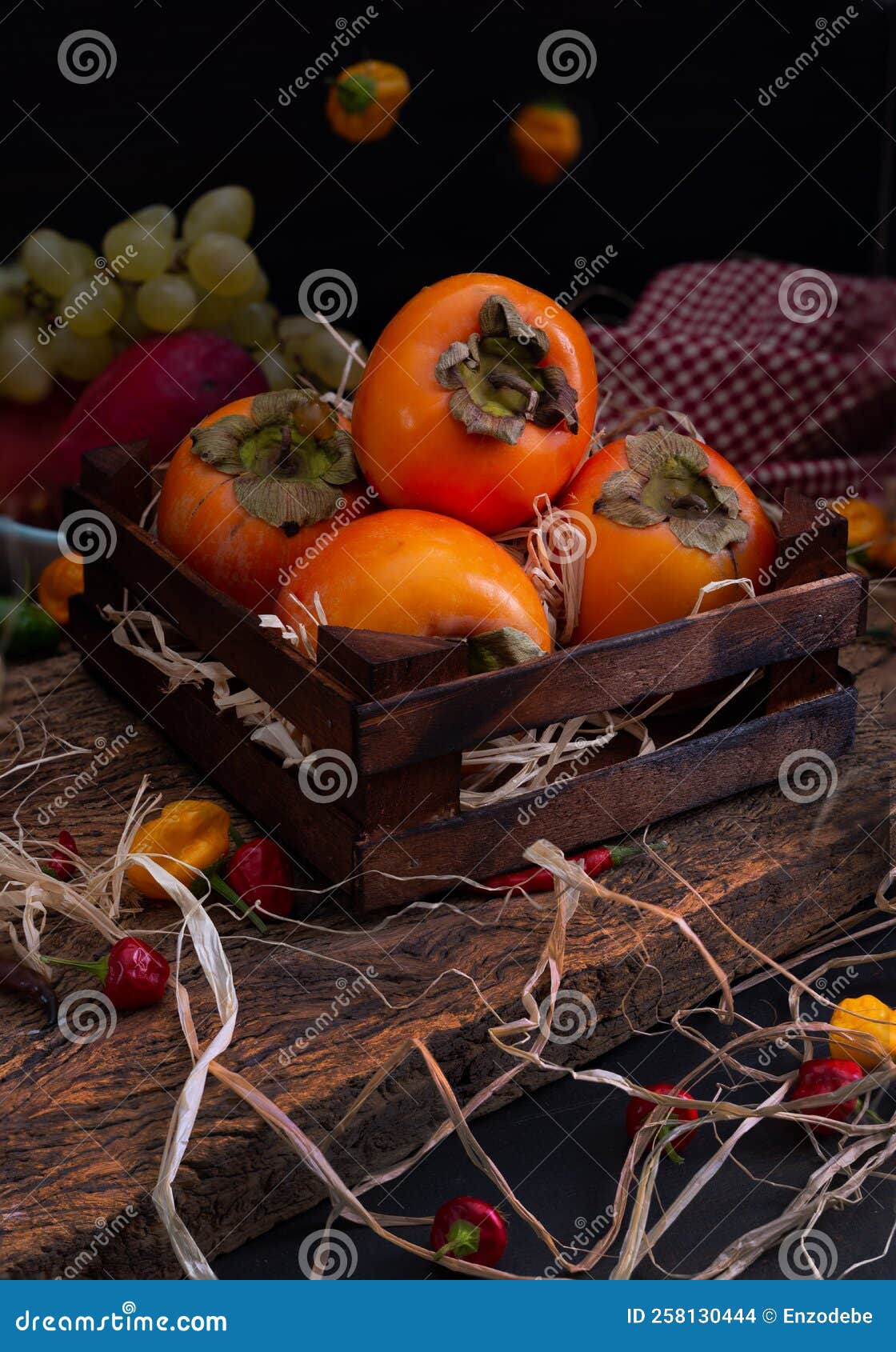 Wooden box with persimmon stock photo. Image of healthy - 258130444